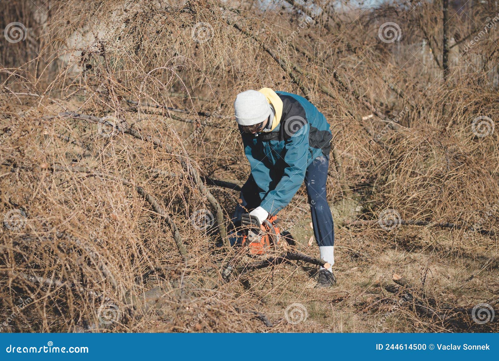 Young 17-year-old Temporary Worker in Work Clothes Wrestles with a ...