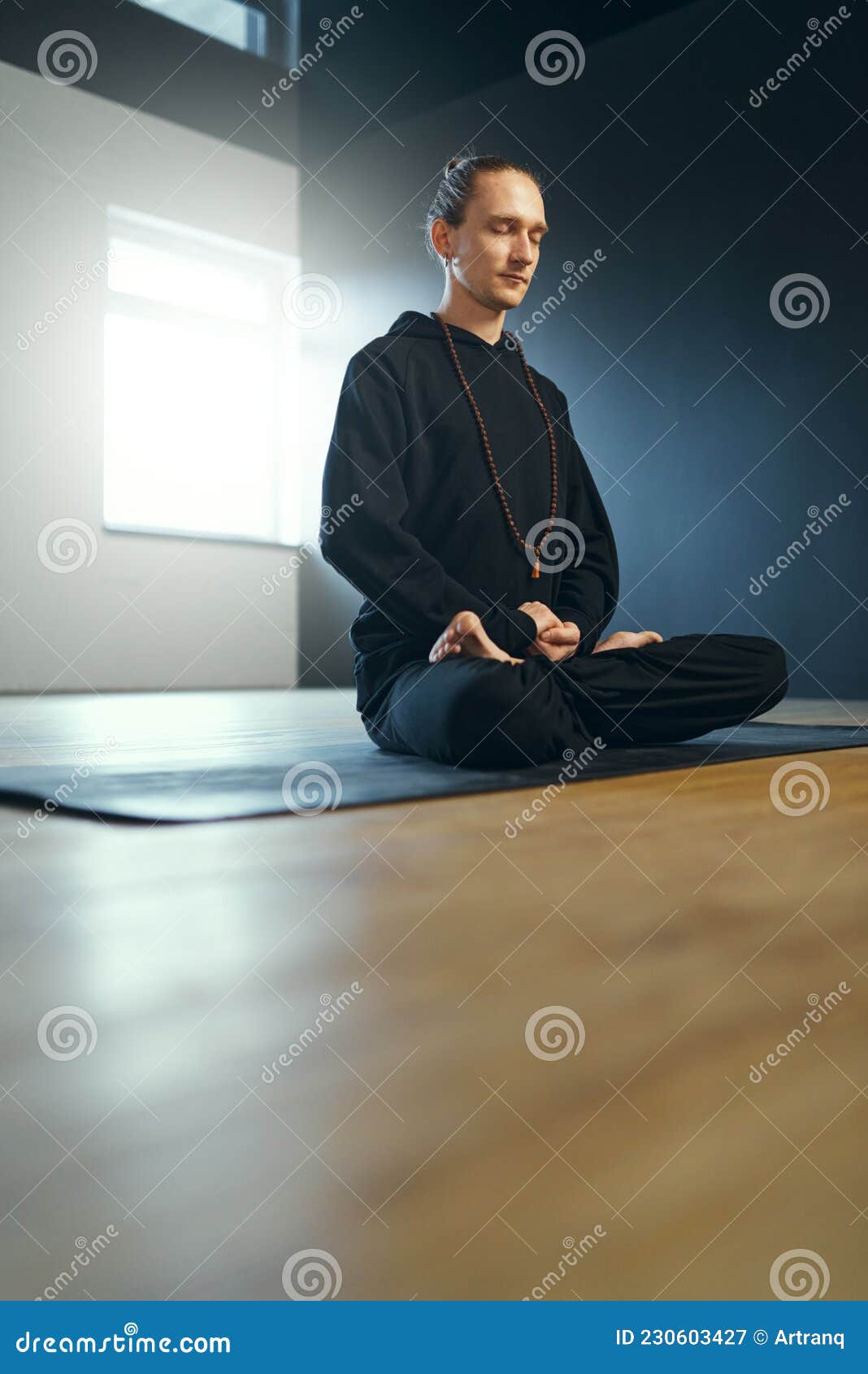 Young Yogi Man Practicing Meditation in Lotus Position. Stock Image ... Young Yogi Man Practicing Meditation in Lotus Position. Stock Image ...