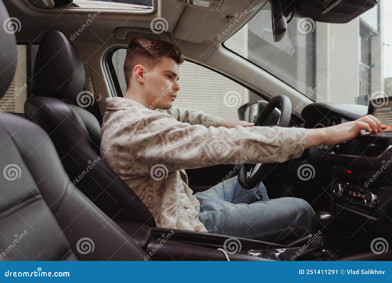 Young Zoomer Driver Sets Special Settings on Display of Control Panel ...