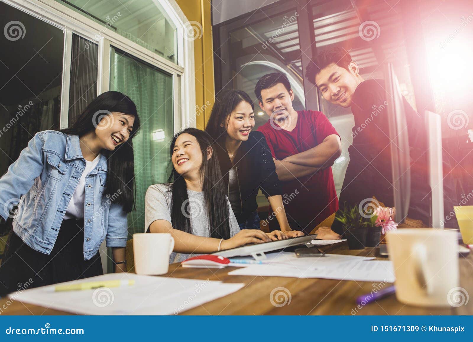 Younger Asian Freelance Team Meeting for Project Solution in Home ...