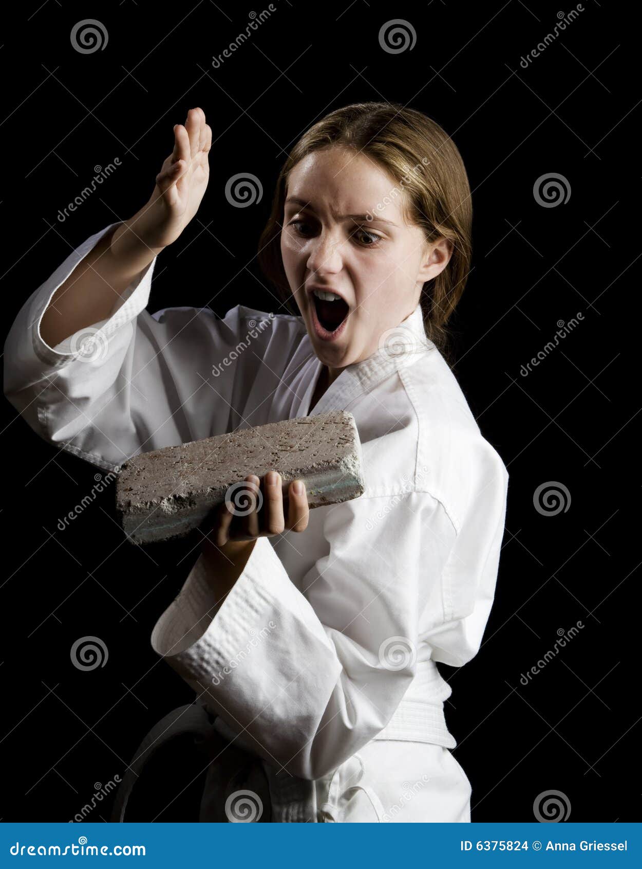 Karate Chop Brick Stock Photos - Free & Royalty-Free Stock Photos from Dreamstime
