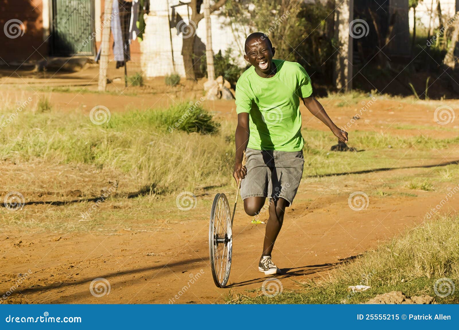 Youngster Playing with Wheel Rim Stock Image - Image of relax ...