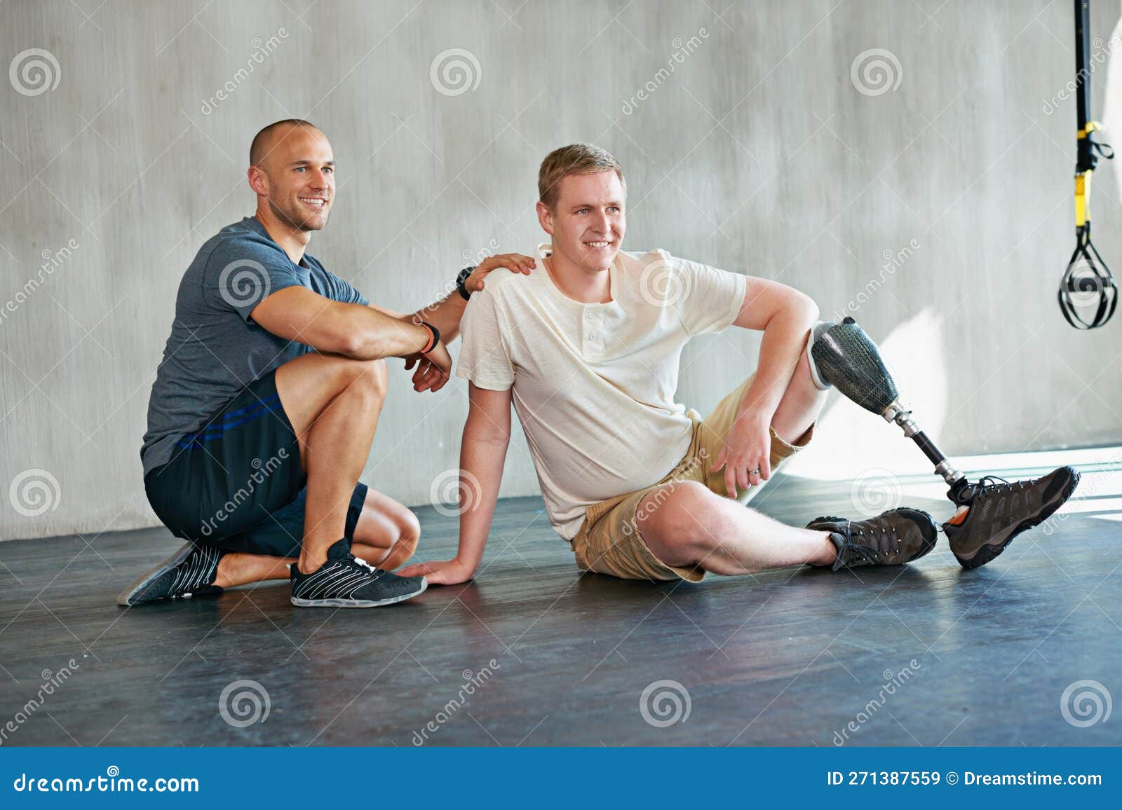Your Progress is Impressive. Studio Shot of a Young Amputee Training in ...