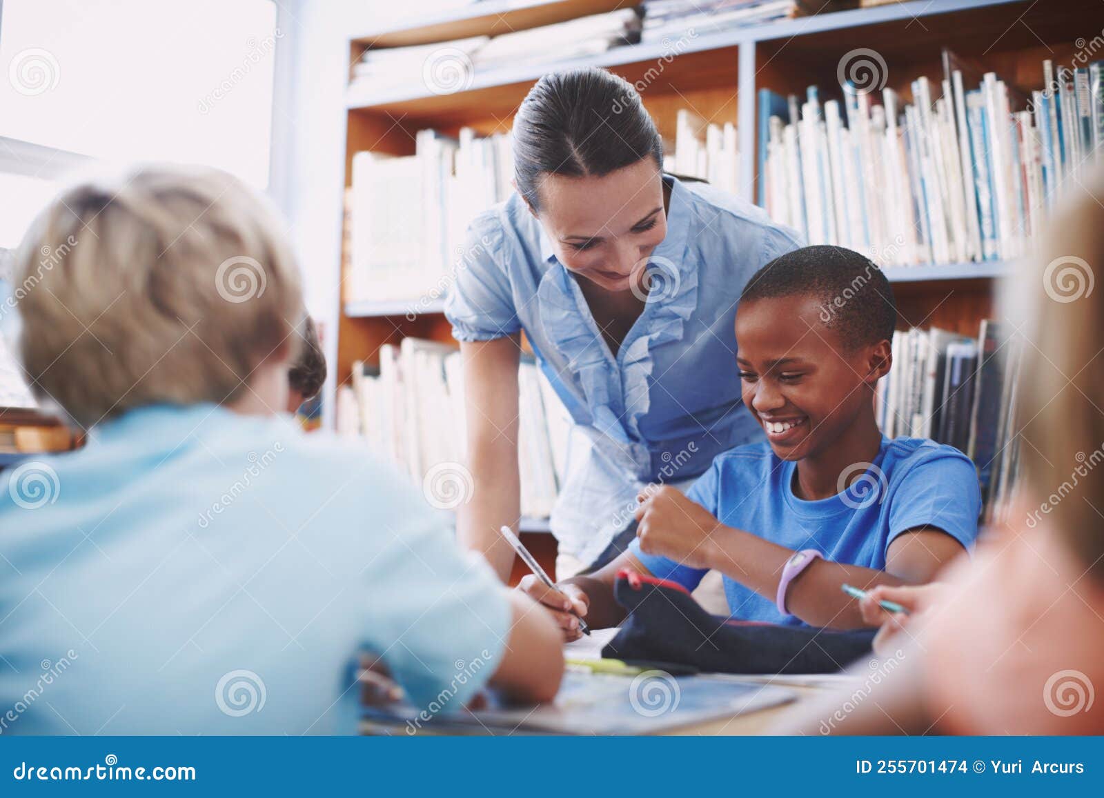 Your Work is Getting Better and Better. a Caring Teacher Sharing a Joke ...