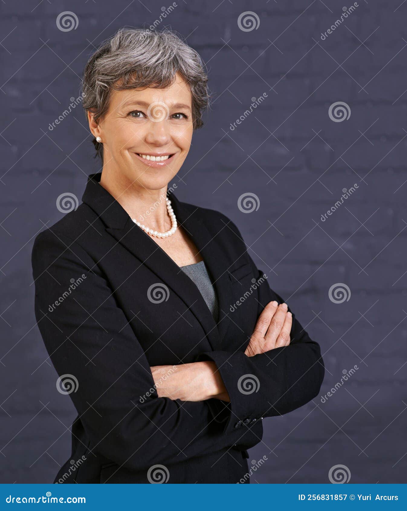 Youre Never Fully Dressed Without A Smile A Happy Woman Posing Against