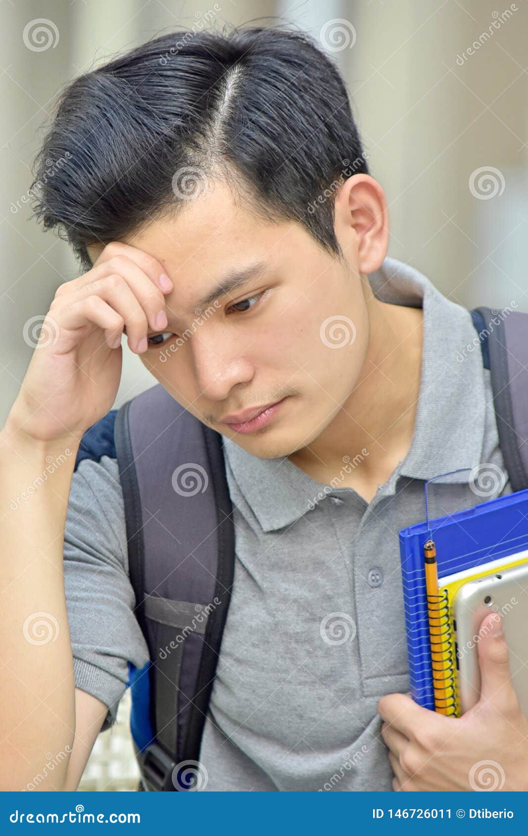 Youthful Filipino Boy Student and Worry with Notebooks Stock Image ...