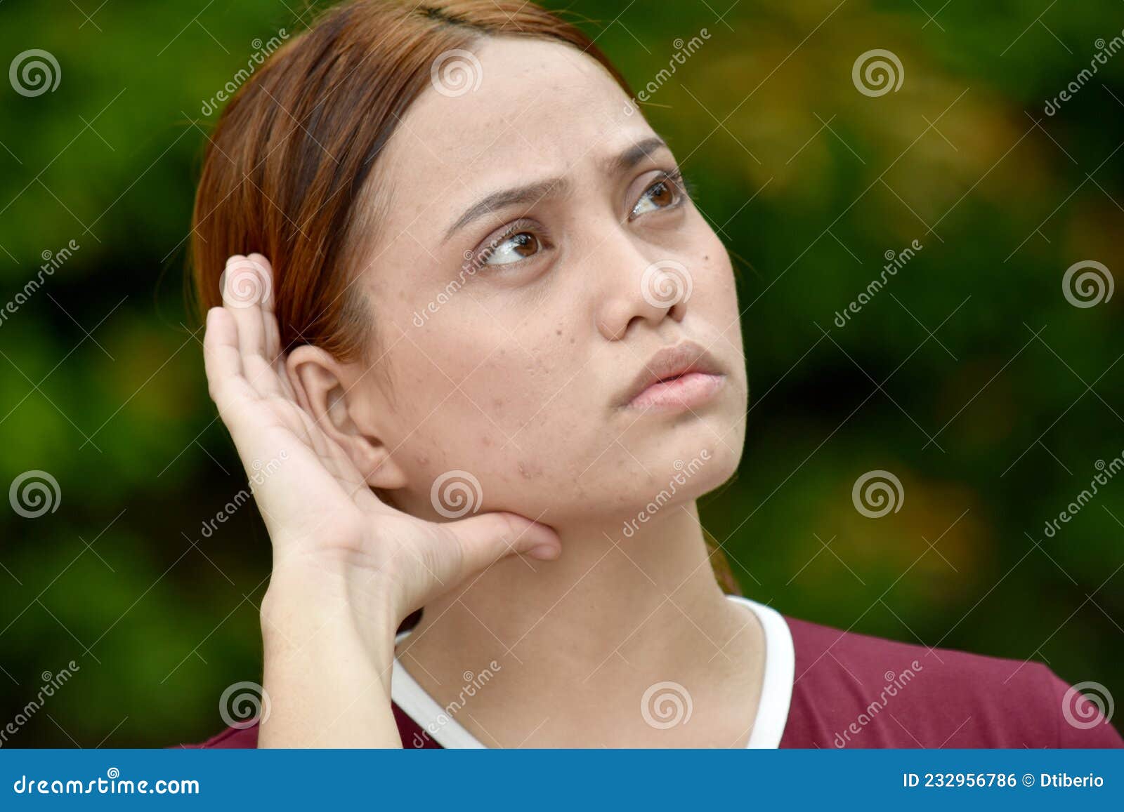 A Youthful Minority Female Hearing Stock Photo - Image of listening ...