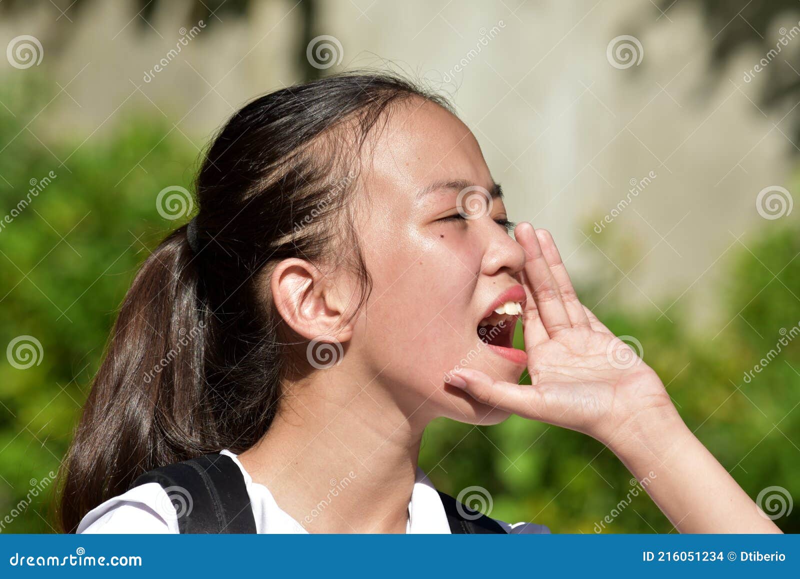 A Youthful Minority Female Student Shouting Stock Photo - Image of ...
