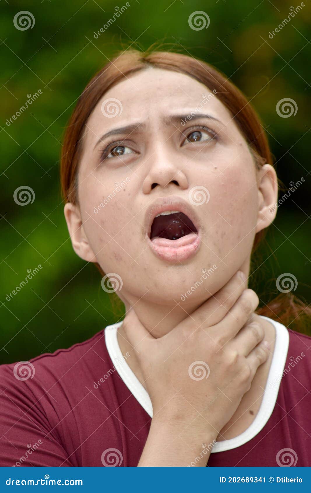 A Youthful Redhead Female Choking Stock Image - Image of nature, ginger ...