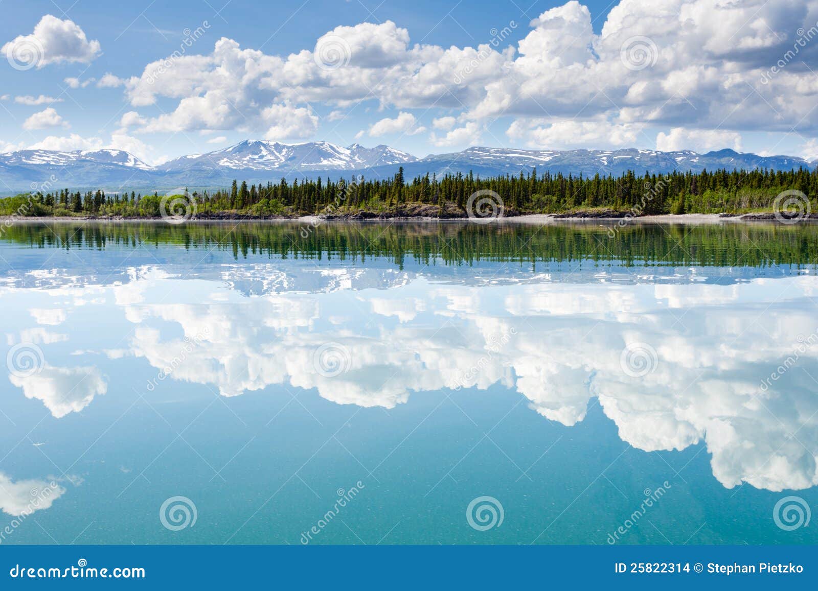 Yukon Wilderness Cloudscape Reflected on Calm Lake Stock Photo - Image ...