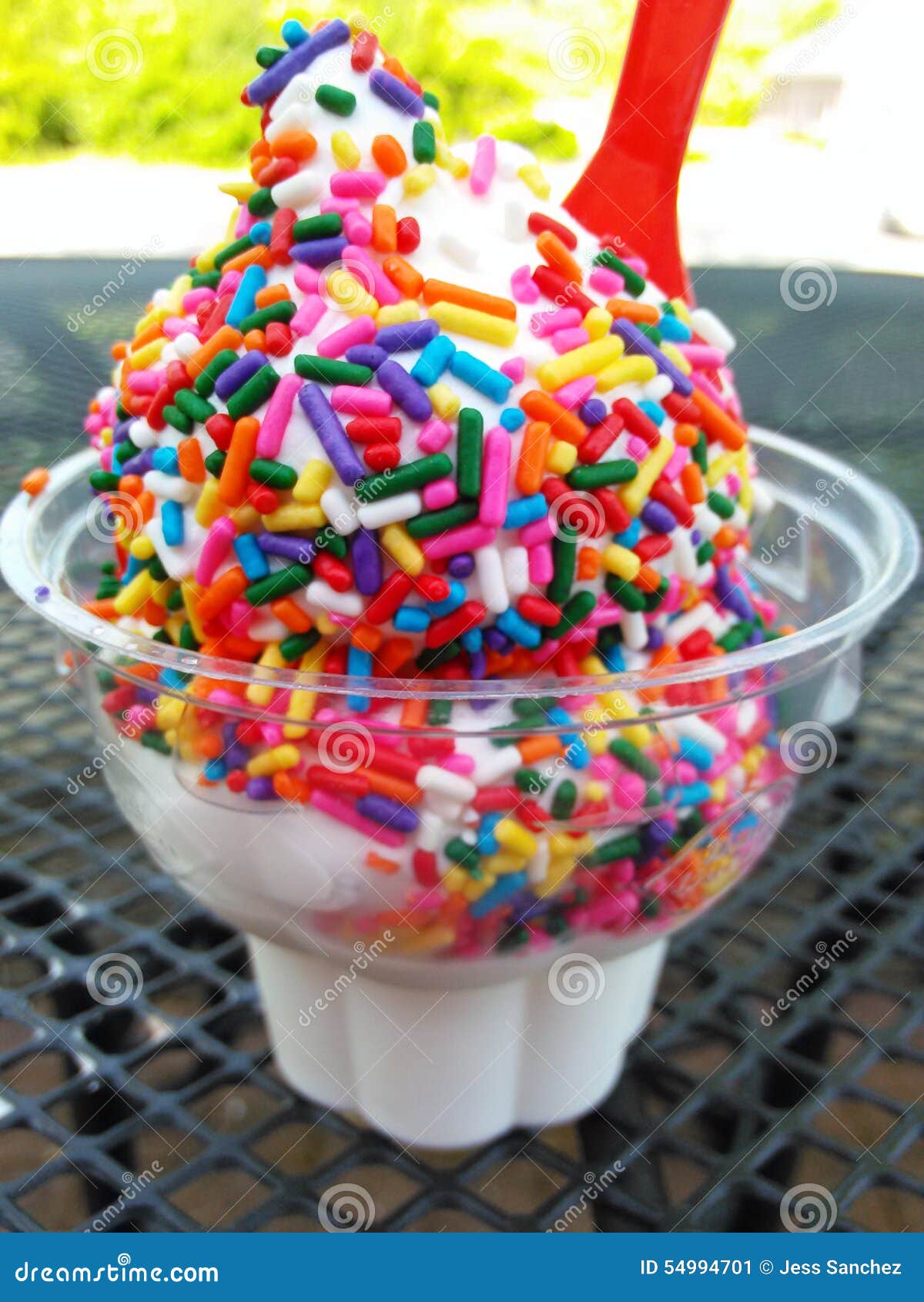 Vanilla Ice Cream Cone With Rainbow Sprinkles