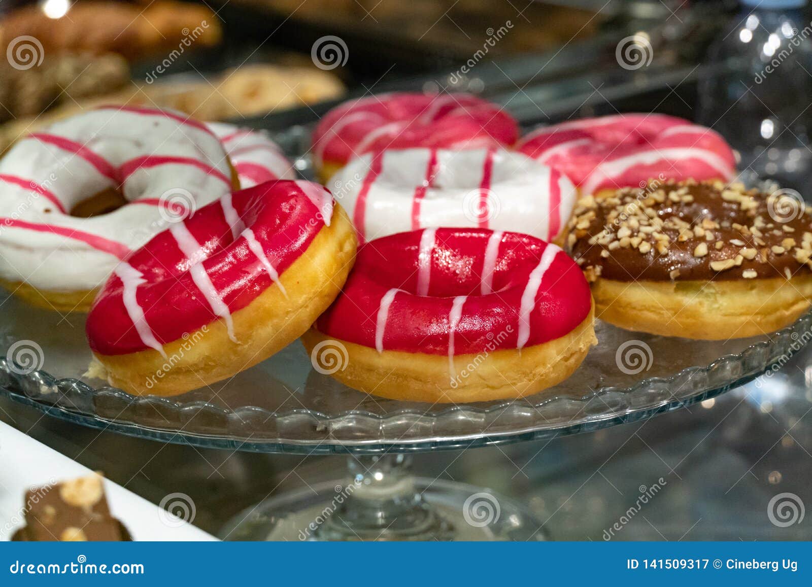 Yummy donuts stock image. Image of cream, colorful, donut - 141509317