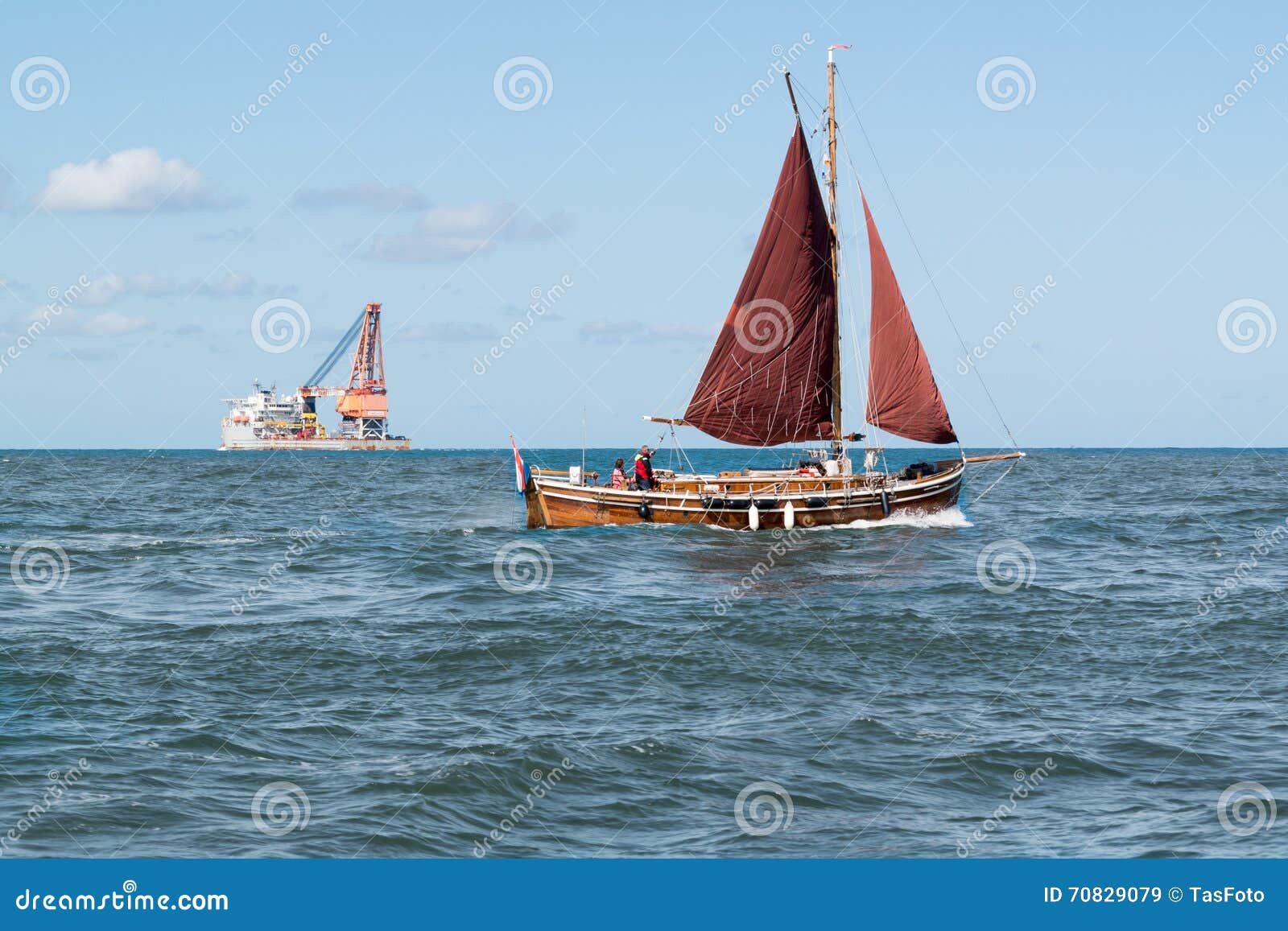 Zeilboot En Groot Schip Op Zee Dichtbij Rotterdam, Nederland ...