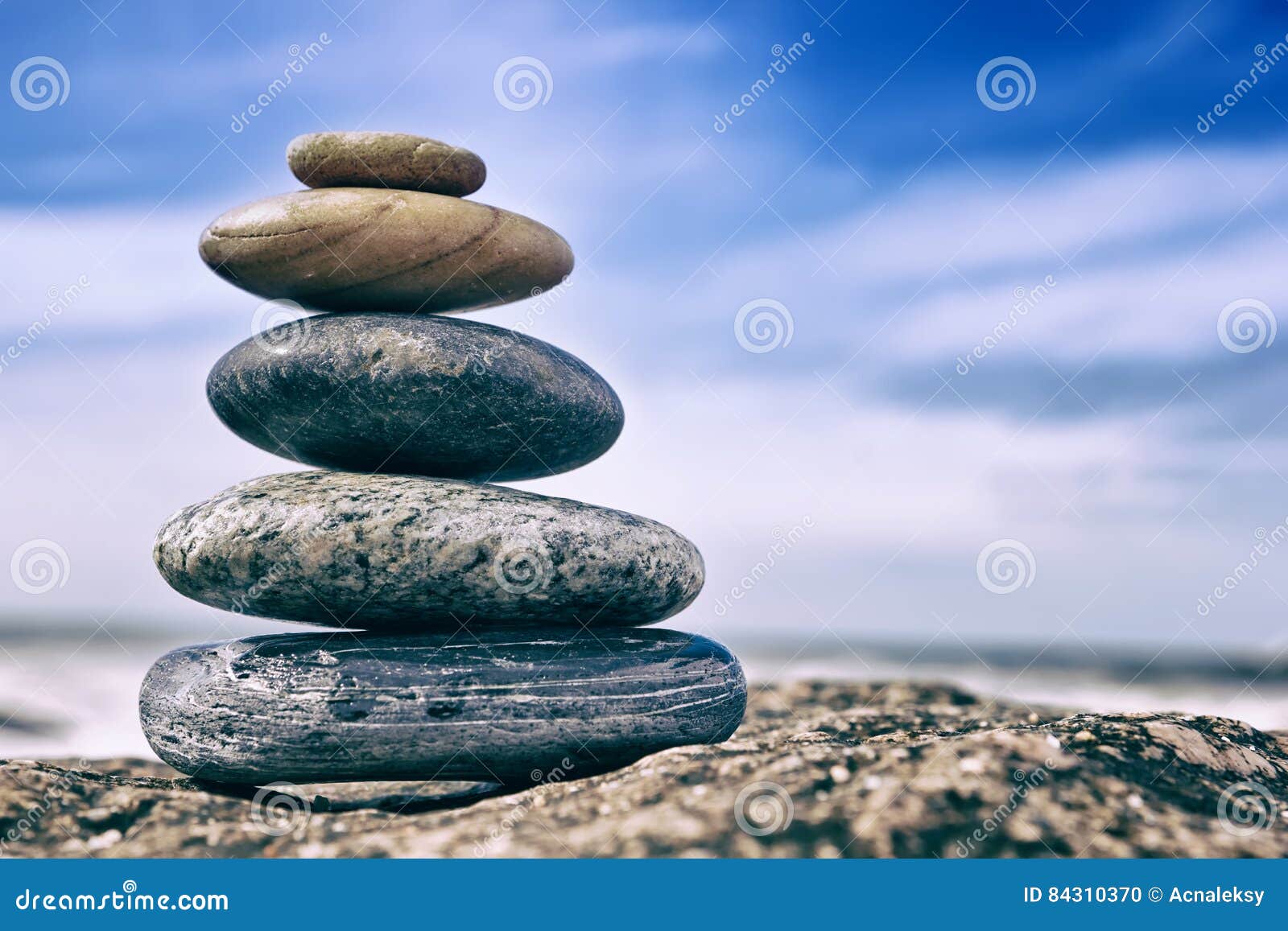 Zen Balancing Pebbles stock photo. Image of cheerful - 84310370