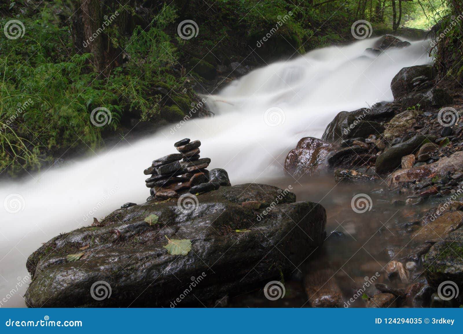 ZEN BALANCING ROCKS NEAR RIVER Stock Image - Image of black, group ...