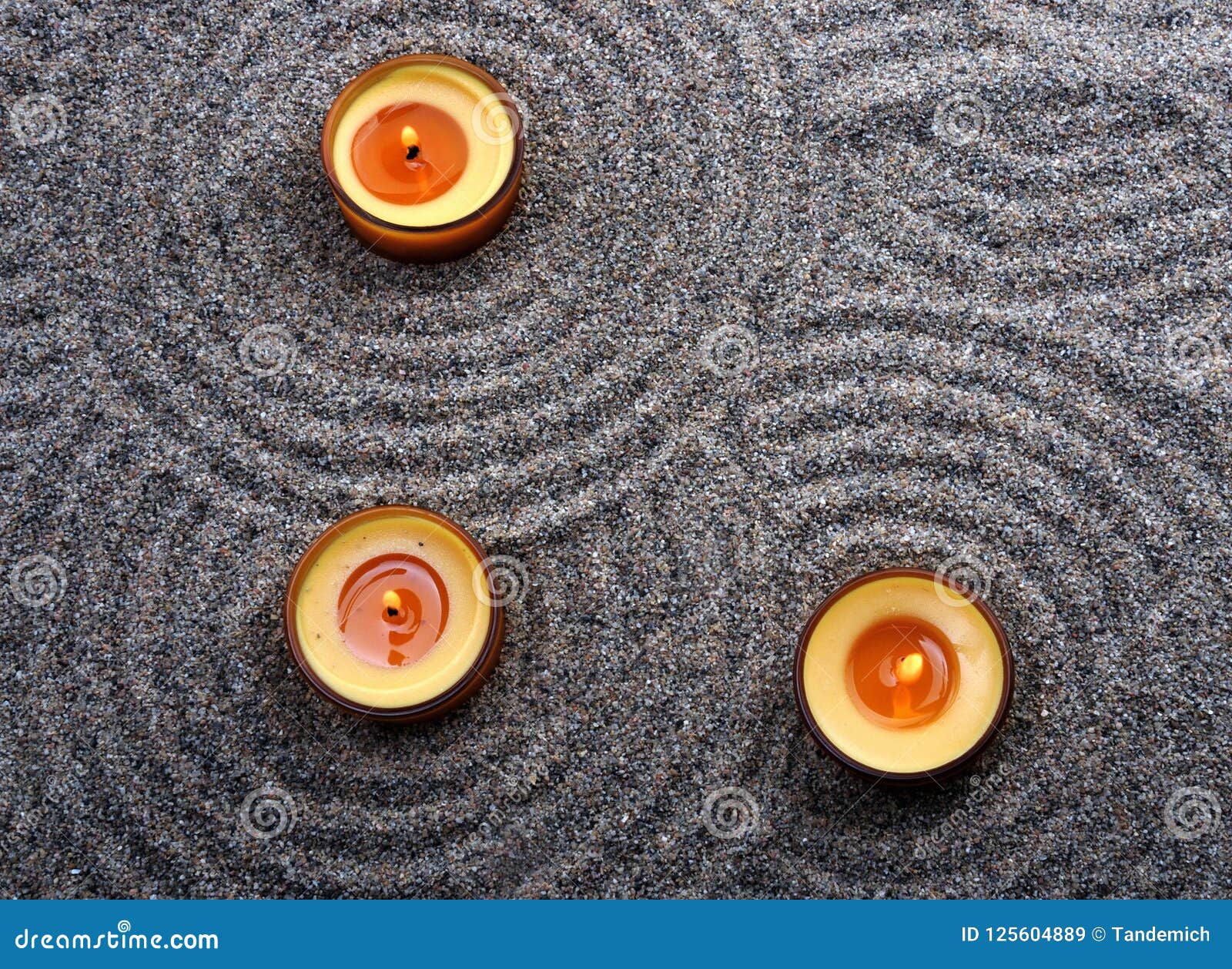 Candles in the Sand. Calming Patterns on the Sand Stock Image - Image ...
