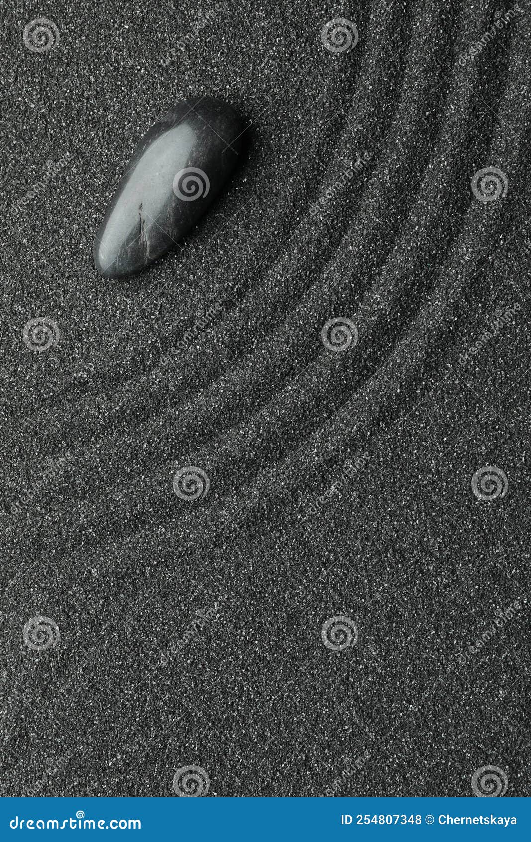 Zen Garden Stone on Black Sand with Pattern, Top View Stock Photo ...