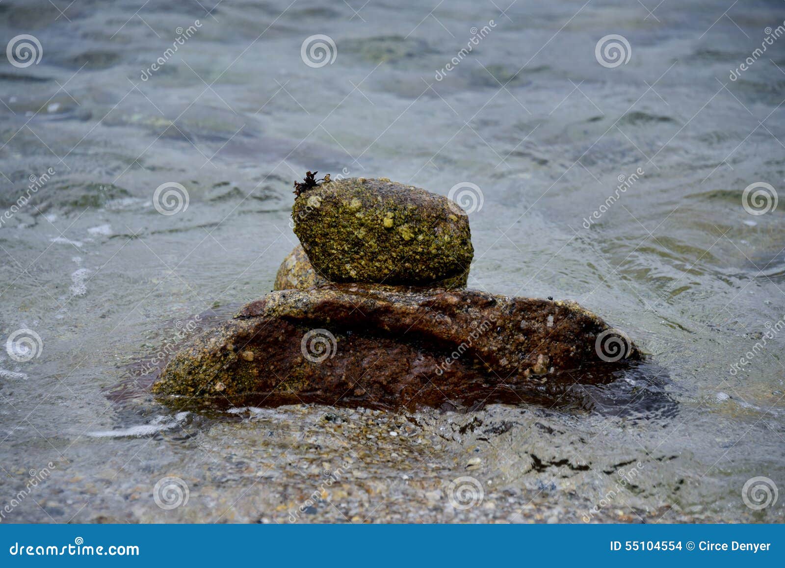 Zen Rock in the Ocean stock photo. Image of wave, balance - 55104554
