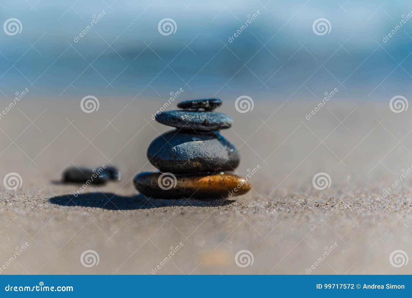 Zen rocks on the beach stock photo. Image of peace, blue - 99717572