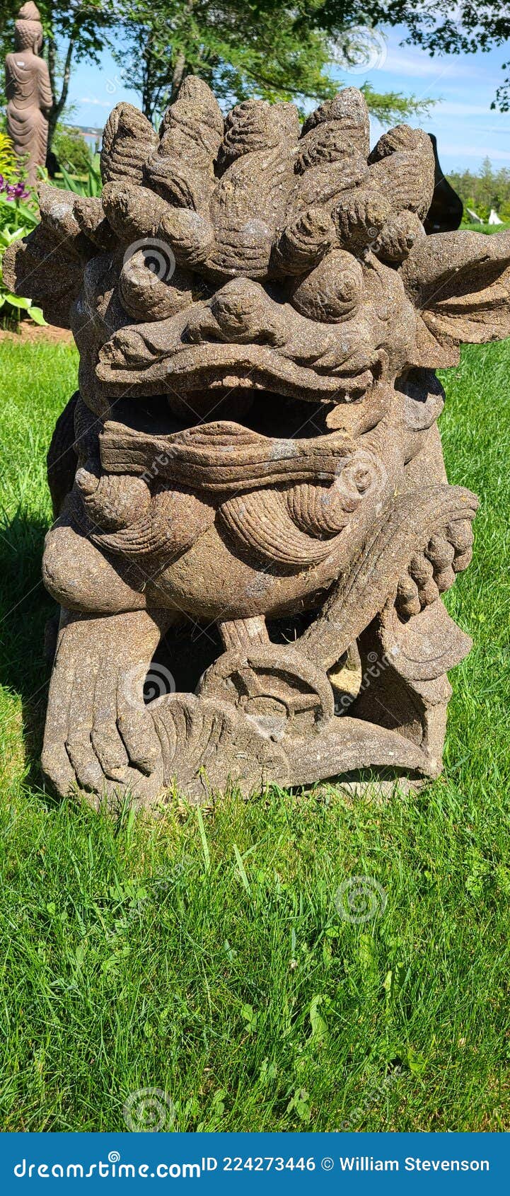 Zen statue in P.E.I stock photo. Image of monument, relief - 224273446