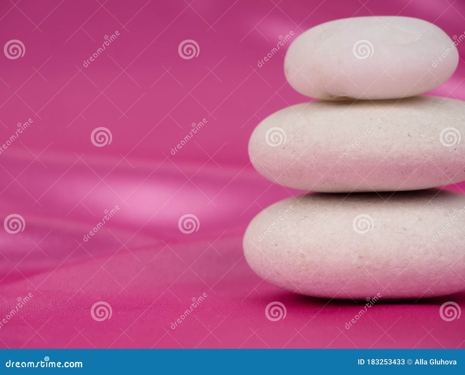 Zen Stones on a Pink Background, Studio Shot of Rocks Balancing on One ...