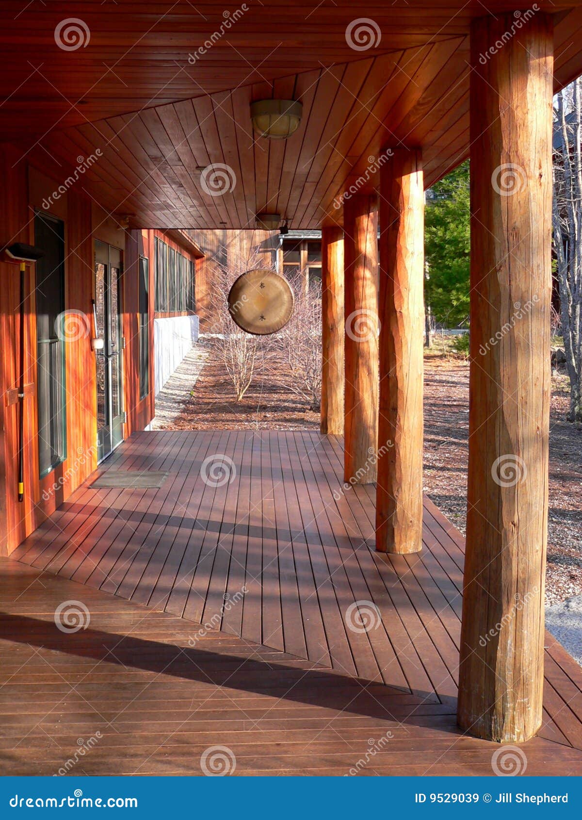 Zen: Wooden Walkway with Disc Gong Stock Image - Image of timber, gong ...