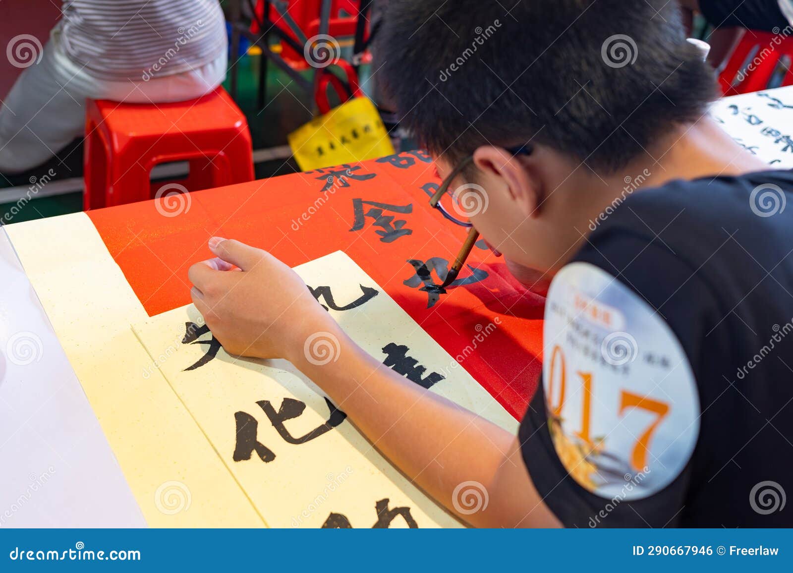 Students in Calligraphy Competition Using Chinese Brushes at Horizontal ...
