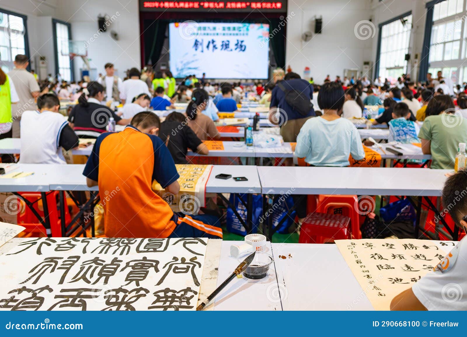 Students in Calligraphy Competition Using Chinese Brushes at Horizontal ...