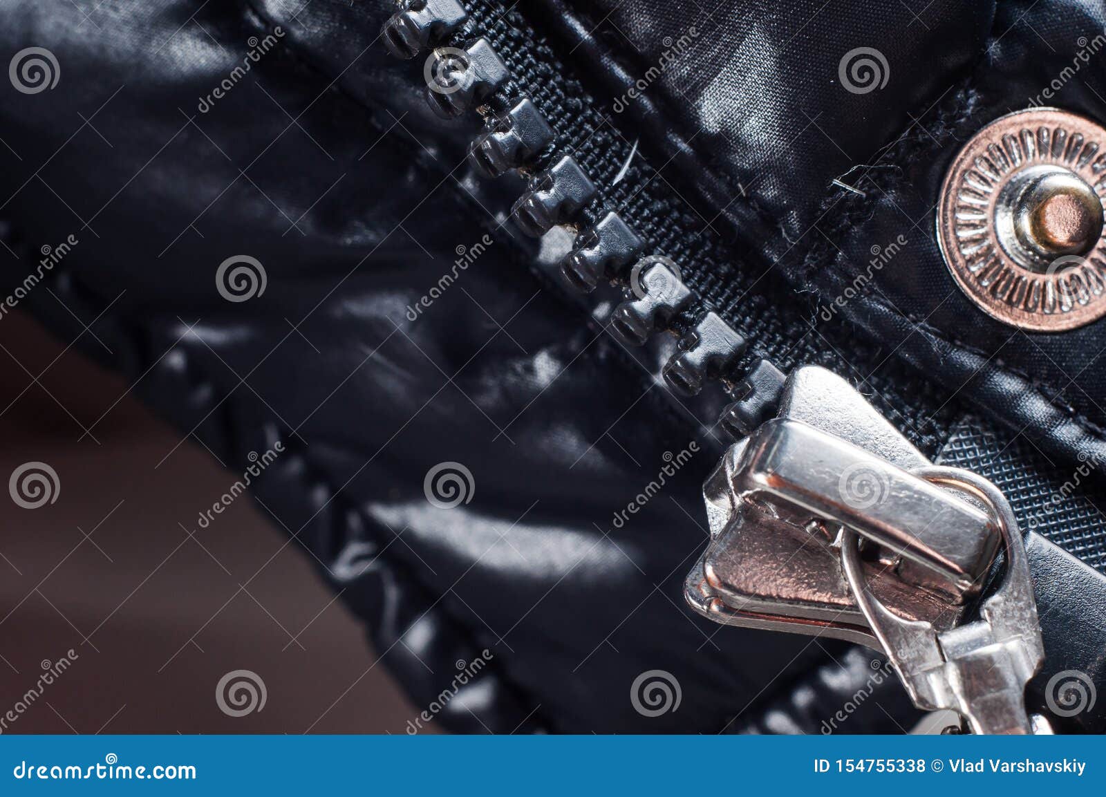 Zipper Clasp with Lock on the Jacket in Black, Close-up Stock Photo ...