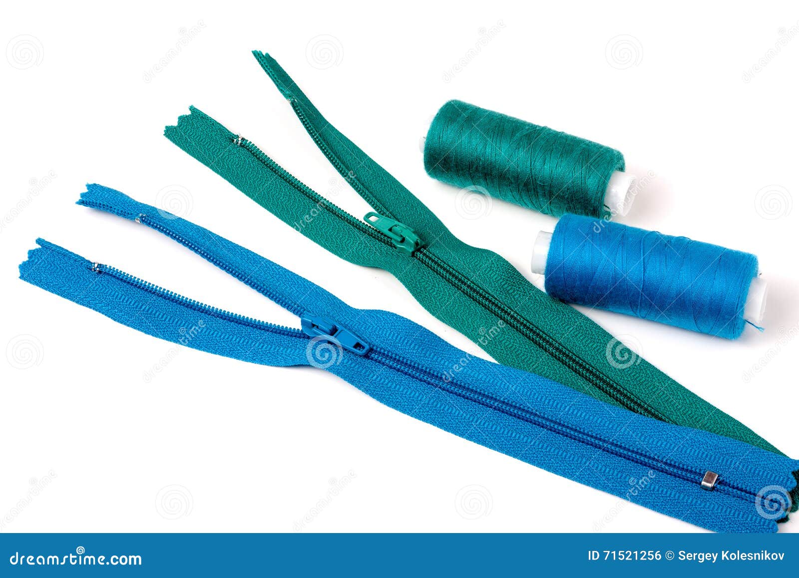 Zipper with a Spool of Thread Isolated on White Background Stock Photo ...