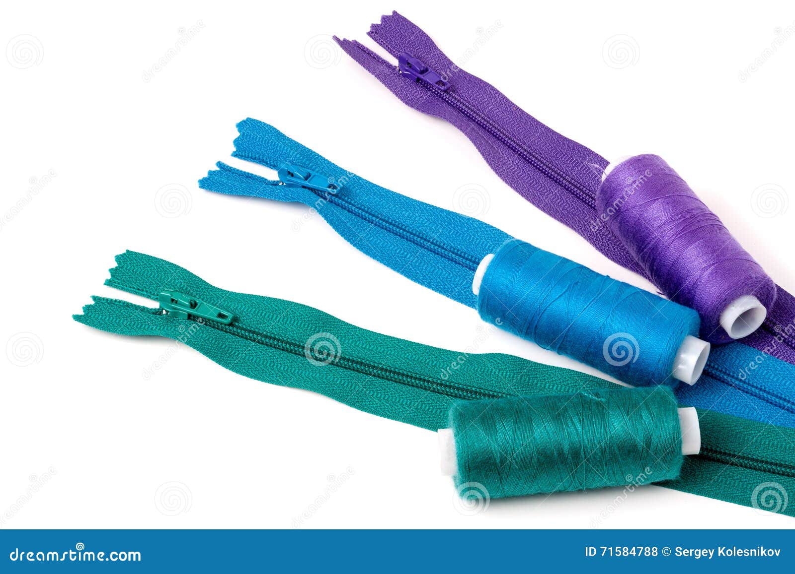 Zipper with a Spool of Thread Isolated on White Background Stock Photo ...