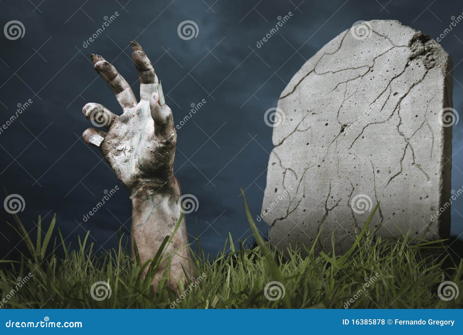 Zombie Hand Rising Out Of The Ground Stock Photo Image Zombie Hand