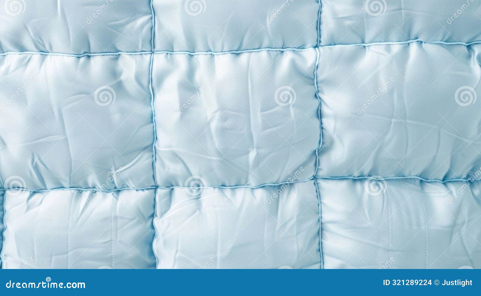 A Zoomedin Image of a Quilted Insulation Material with Rows of Square ...