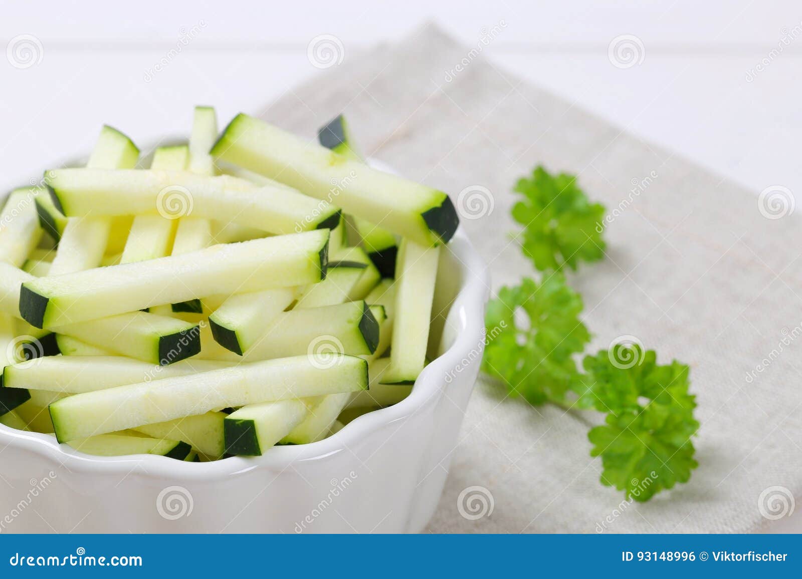 Zucchini cut into strips stock photo. Image of bowl, white - 93148996